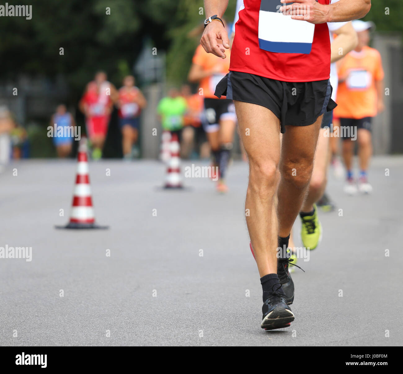 Sportsman running road work hi-res stock photography and images - Alamy