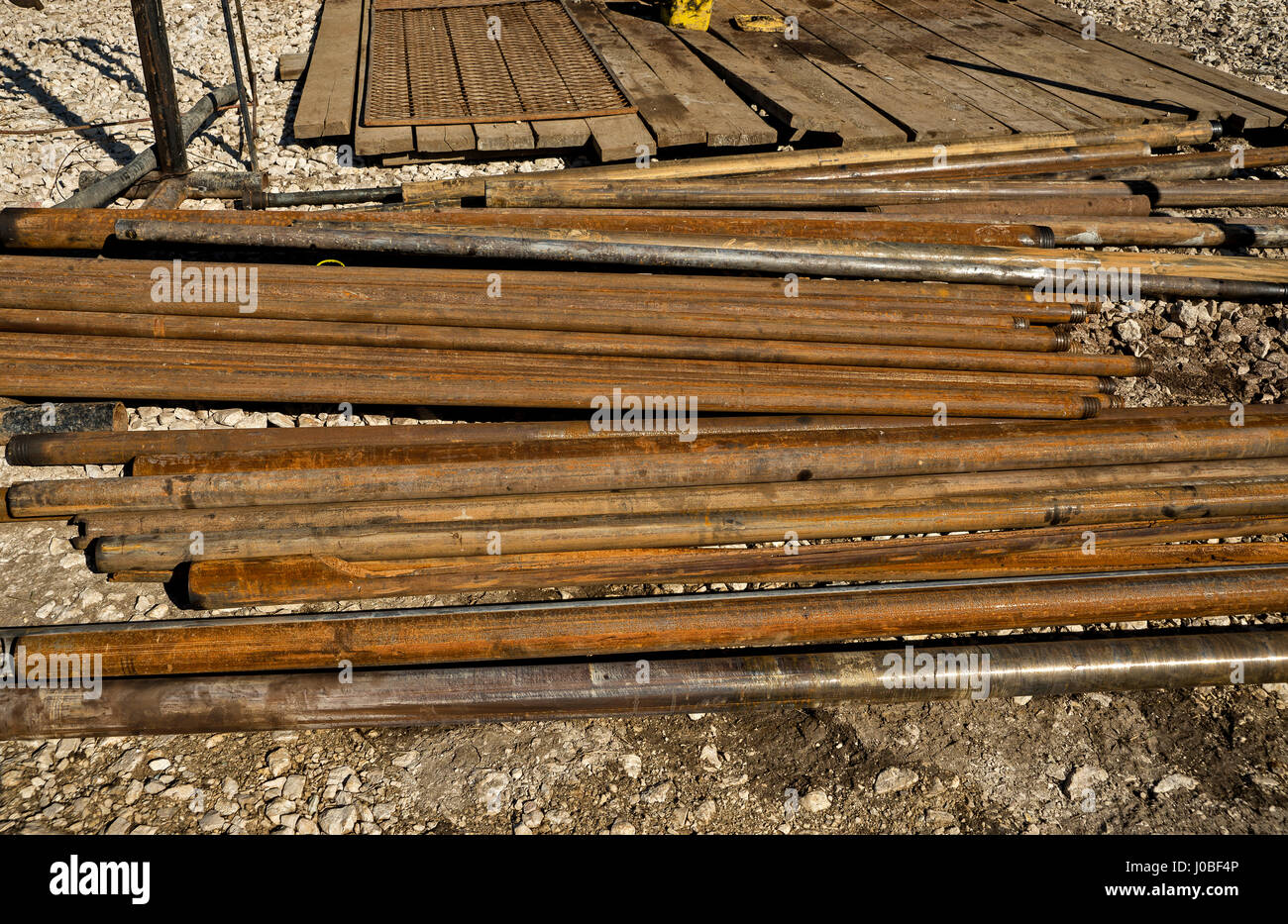 Rust stell pipe for drilling in geology and mining Stock Photo - Alamy
