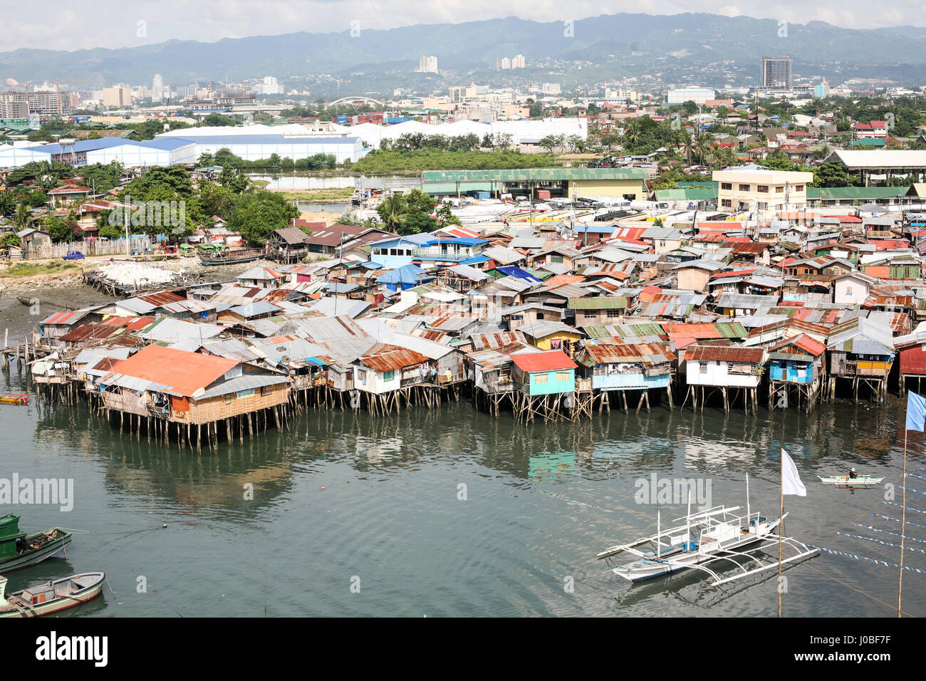 Everyday life of filipinos. Settlement on water in Cebu city ...