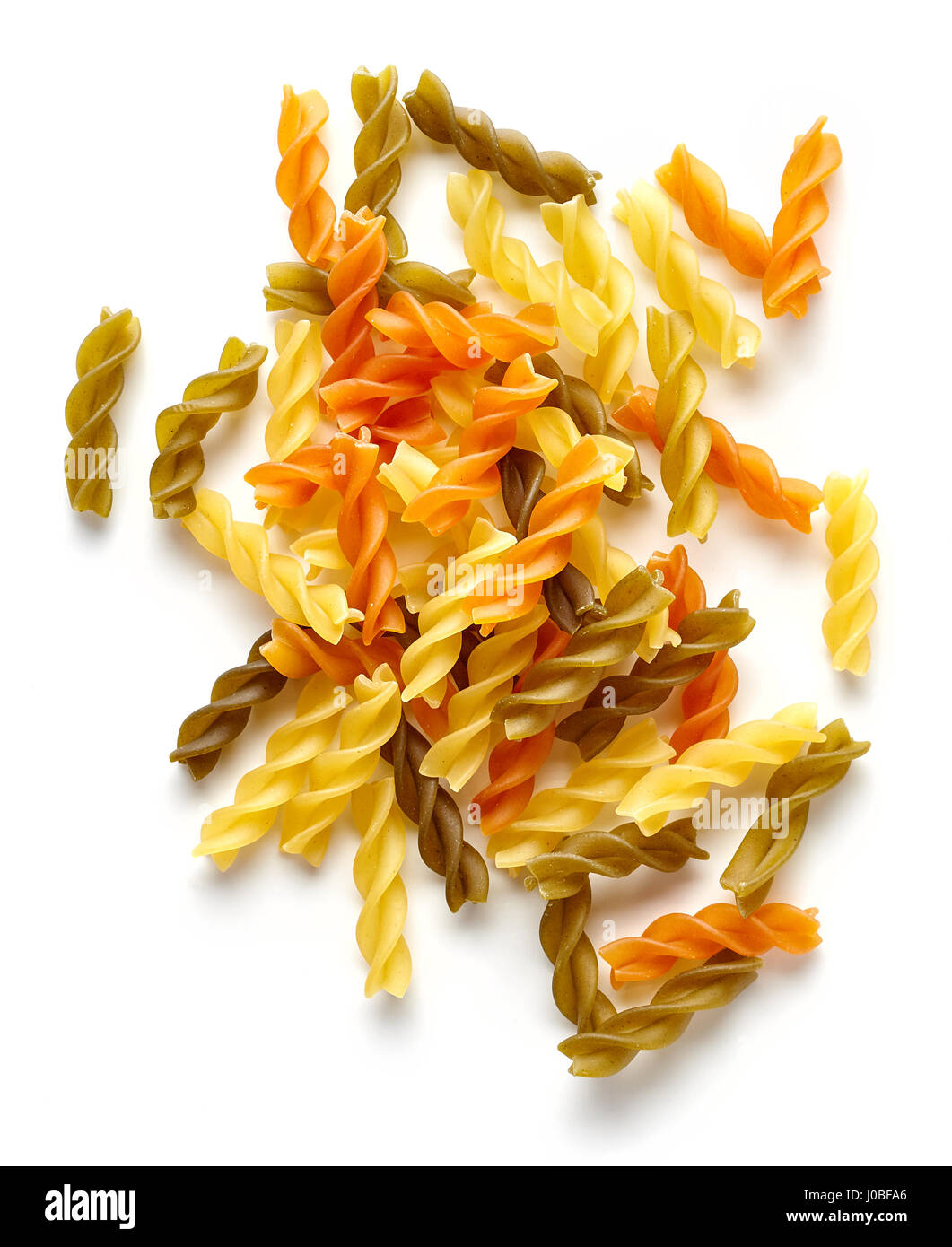 Colored pasta isolated on white background, top view Stock Photo - Alamy