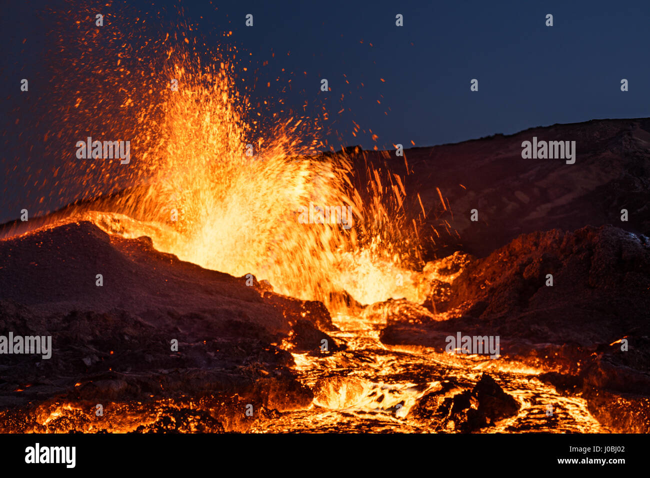 The powerful volcanic eruption lights up the night sky. HAIR-RAISING ...