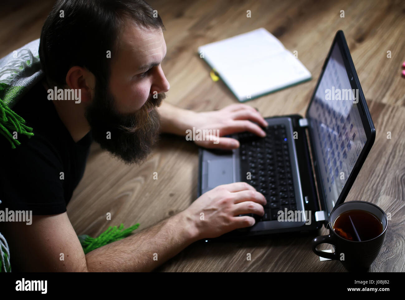 the man on the floor computer Stock Photo - Alamy