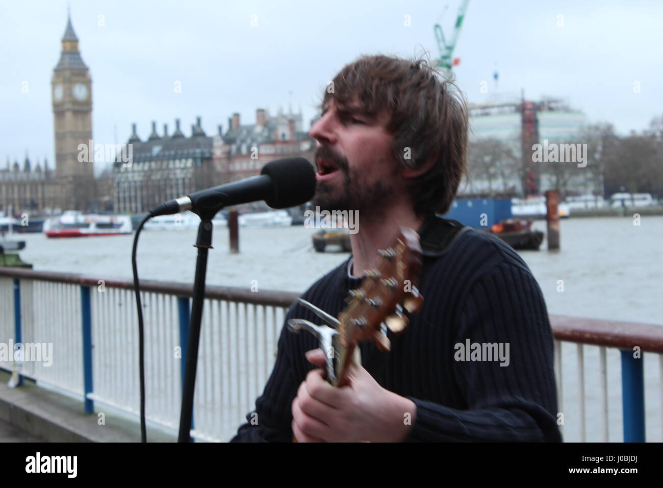 Busker on side street in hi-res stock photography and images - Alamy