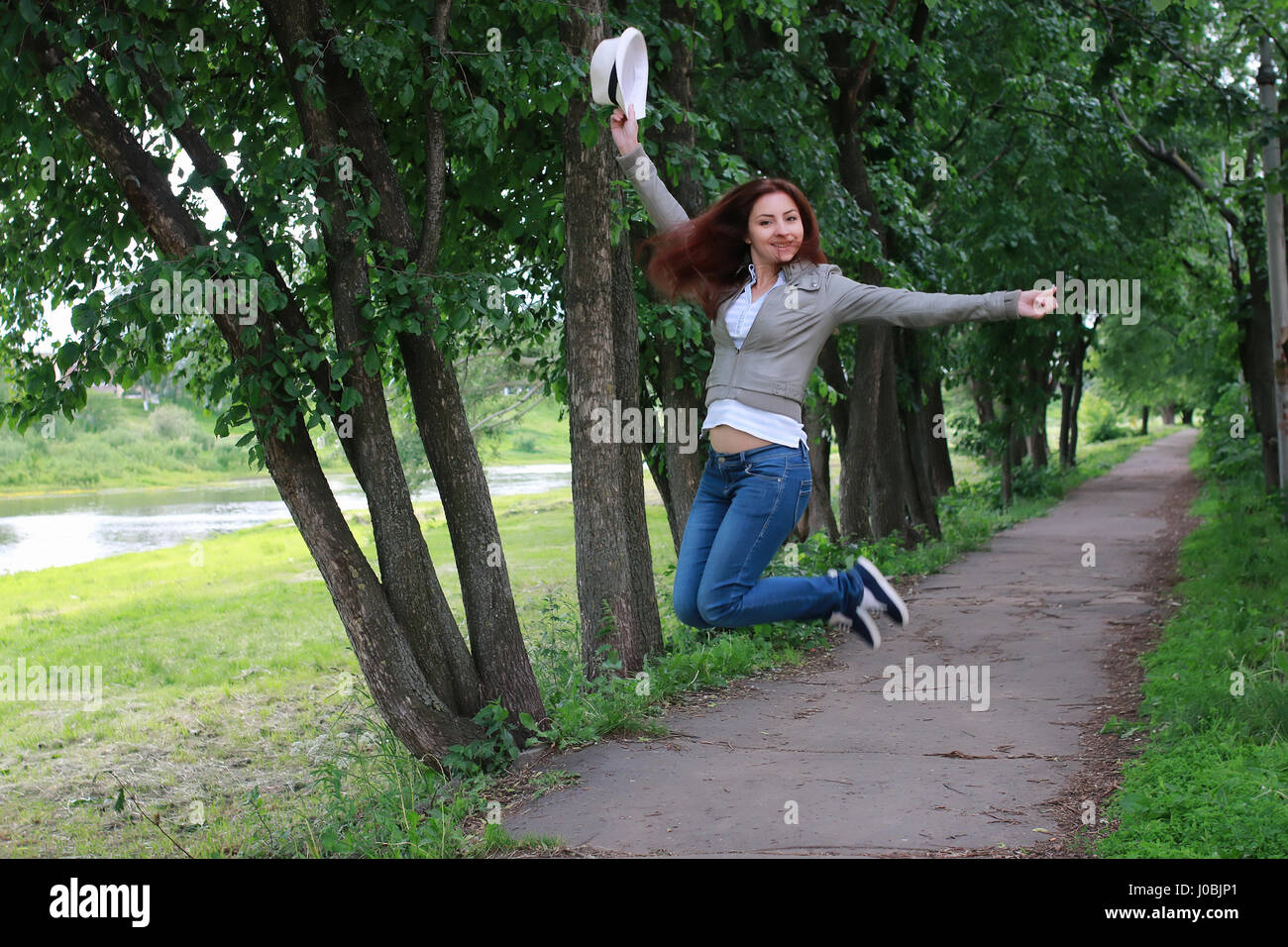 woman in tree park outdoor Stock Photo - Alamy