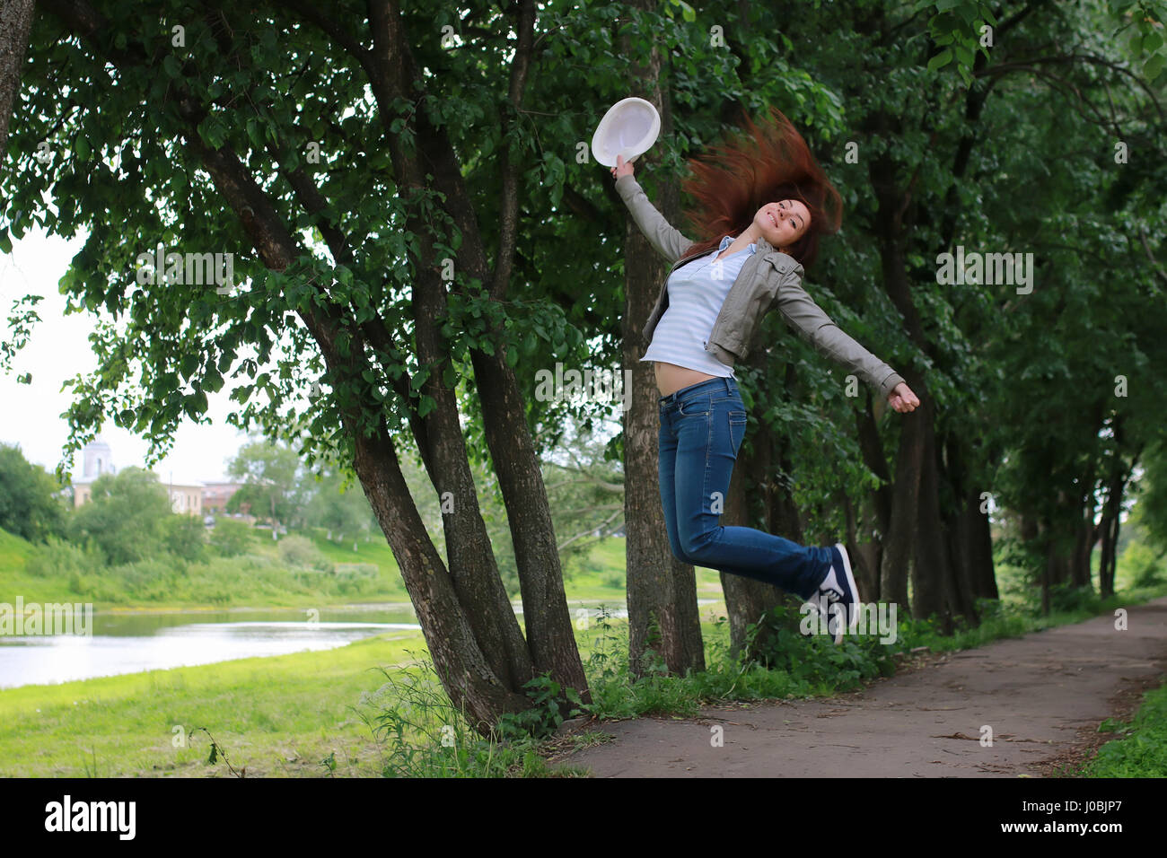 woman in tree park outdoor Stock Photo - Alamy