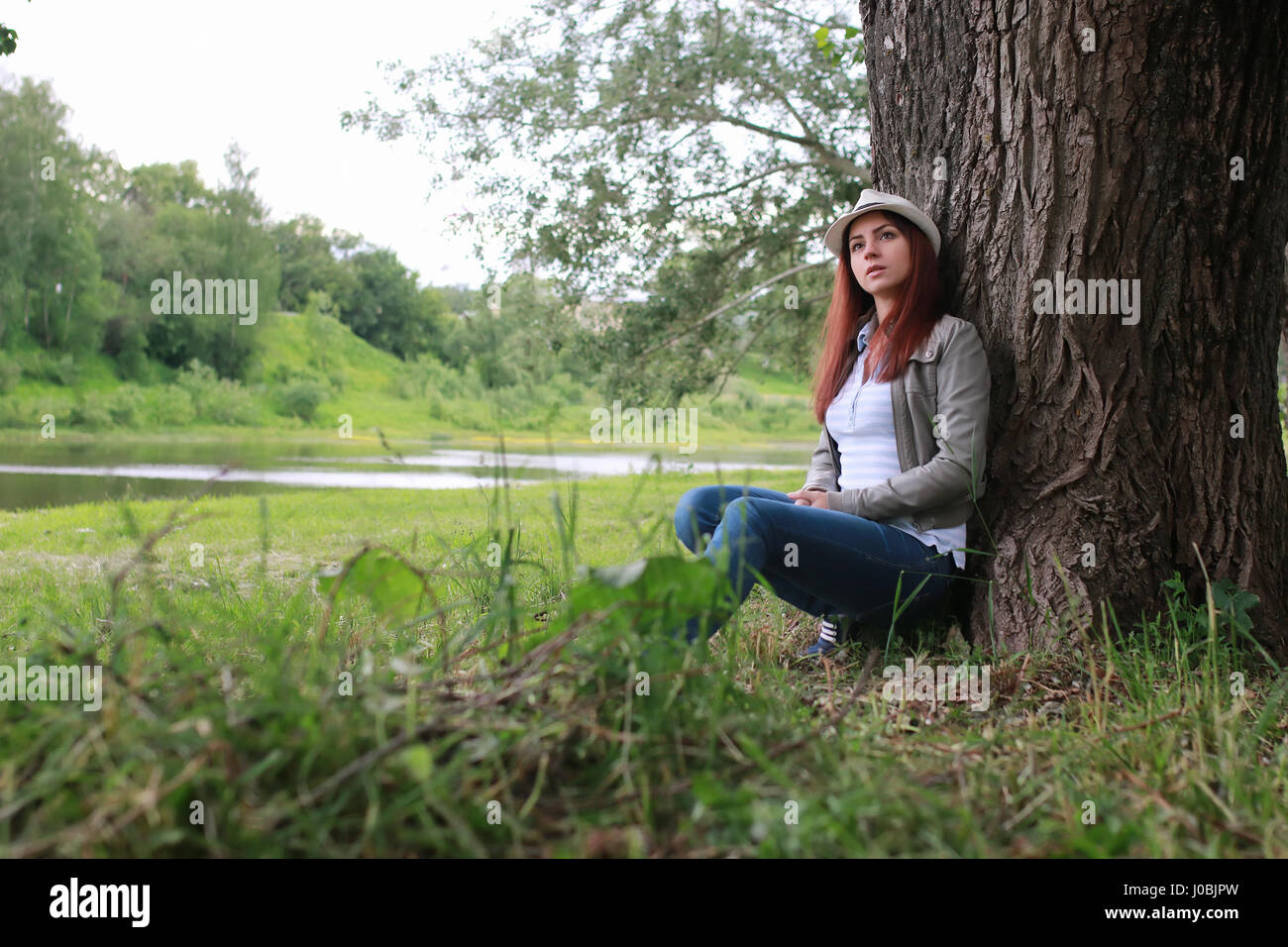 woman in tree park outdoor Stock Photo - Alamy