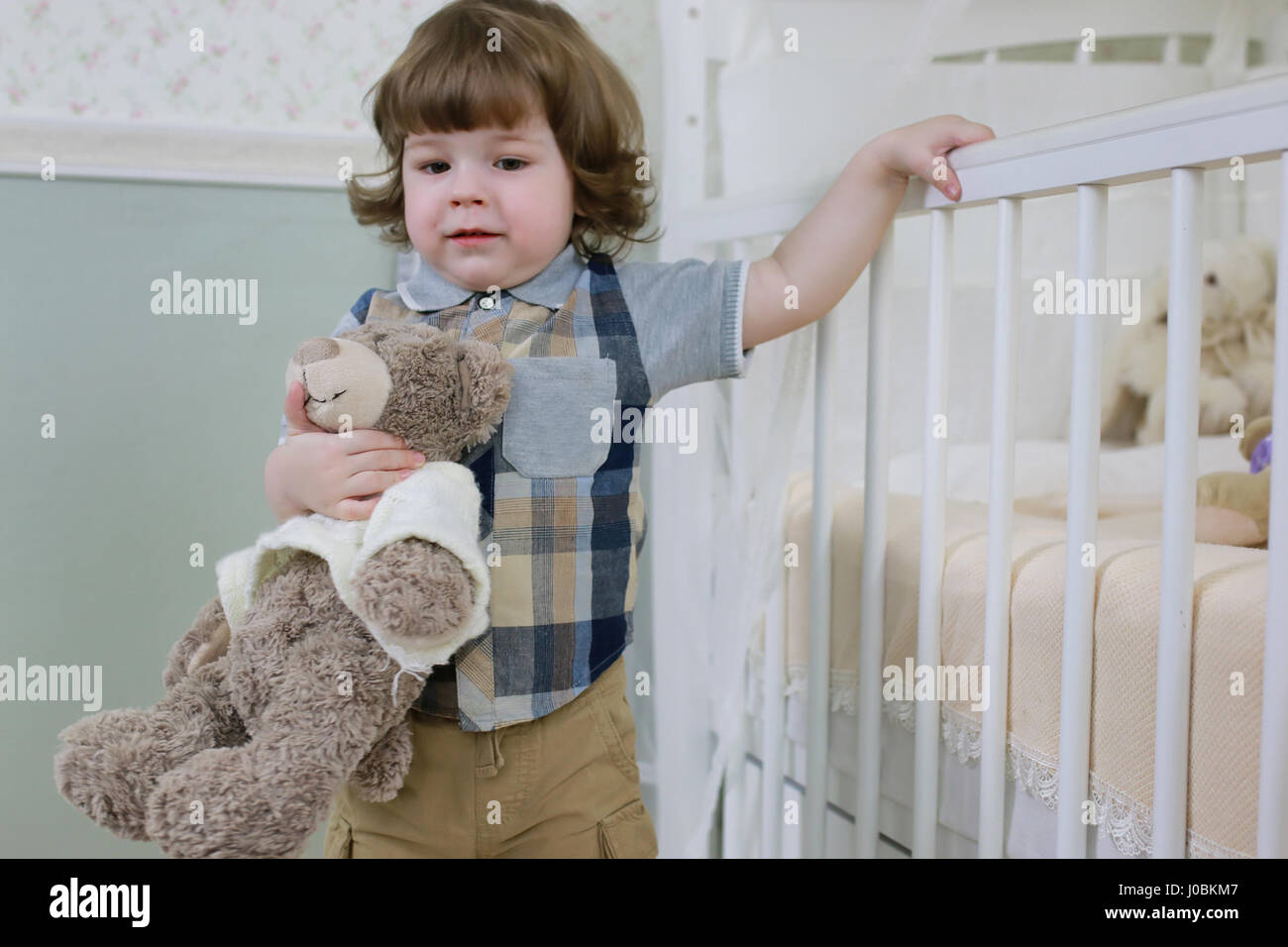 litle kid stand at bedroom Stock Photo - Alamy