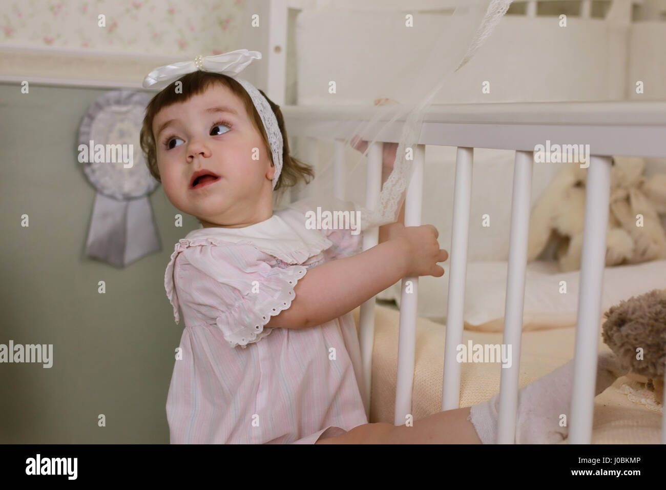 litle kid stand at bedroom Stock Photo - Alamy