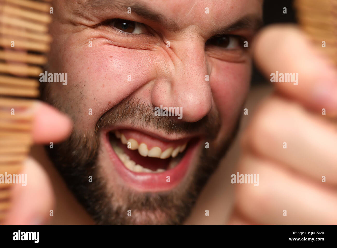 angry man at the jalousie Stock Photo - Alamy