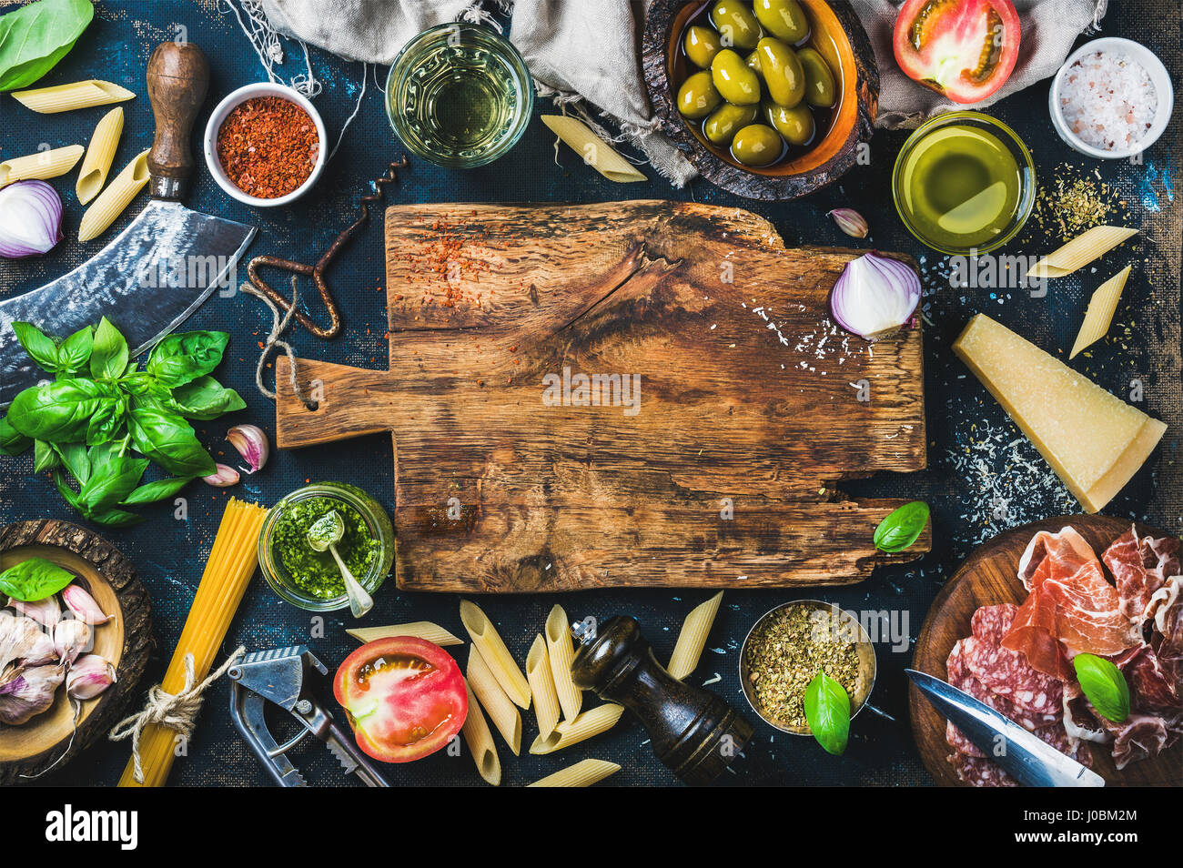 Italian food cooking ingredients on dark background Stock Photo - Alamy