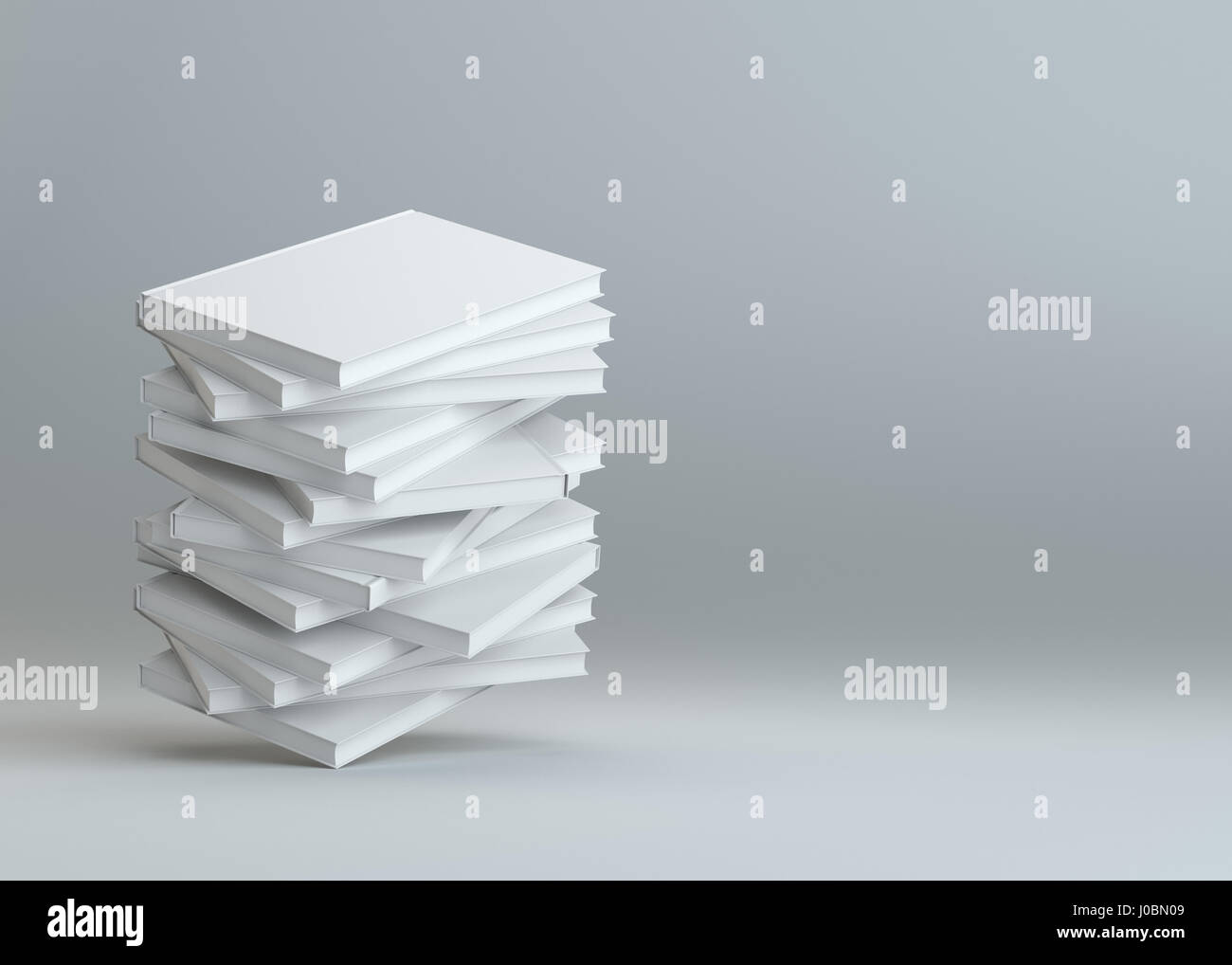 Stack of white empty books on gray background Stock Photo - Alamy