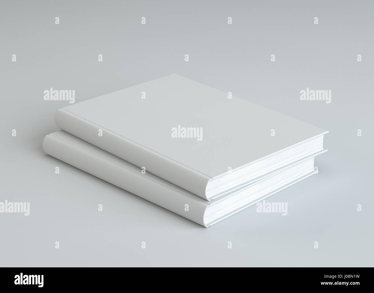 Two empty white books Stock Photo - Alamy