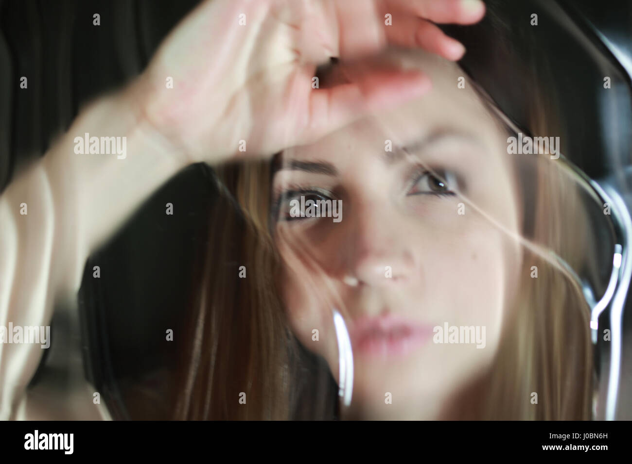 girl face behind glass Stock Photo - Alamy