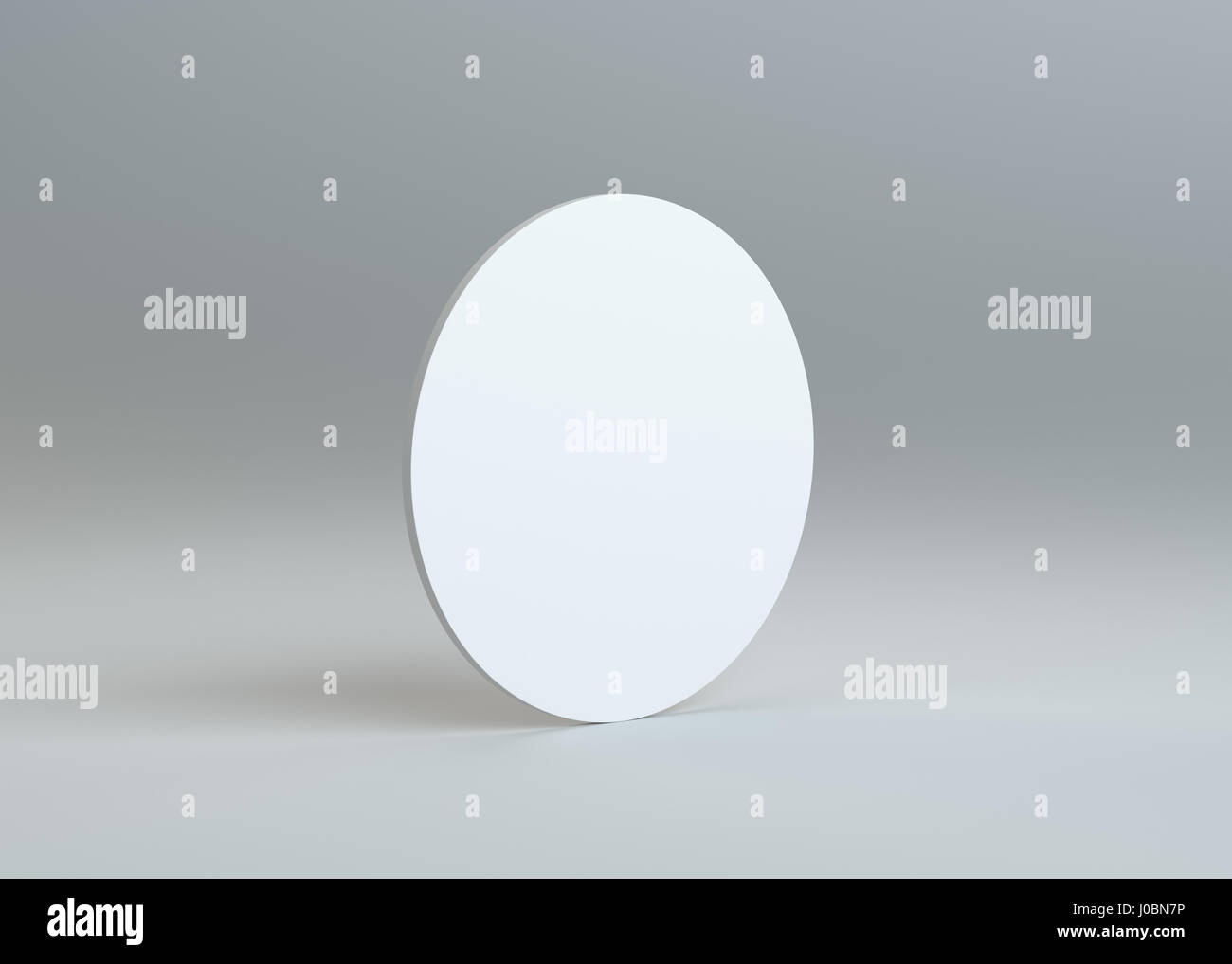 White empty paper disk on gray background Stock Photo - Alamy