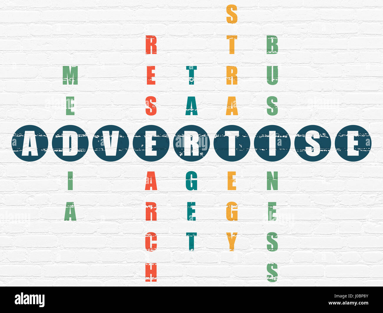 Advertising concept: Advertise in Crossword Puzzle Stock Photo - Alamy