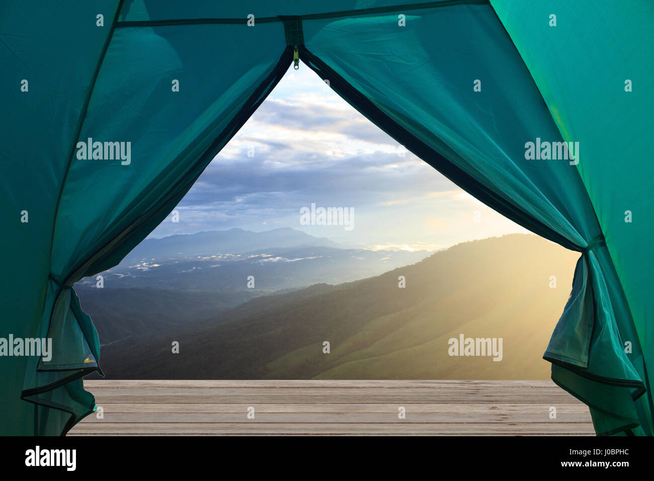 view from open tent, beautiful green mountains and forest on top veiw ...