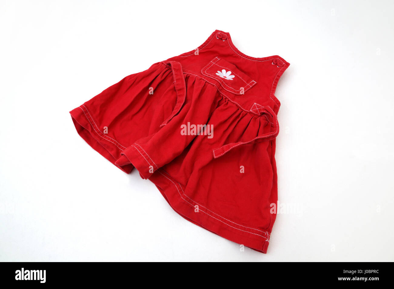 Baby's Red Denim Dress With Daisy Design And tie Stock Photo - Alamy