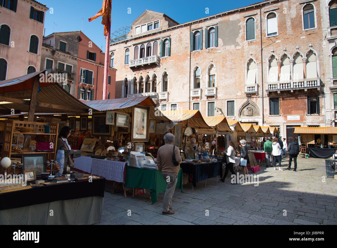 Antiques market in San Maurizio square, Venice Stock Photo - Alamy