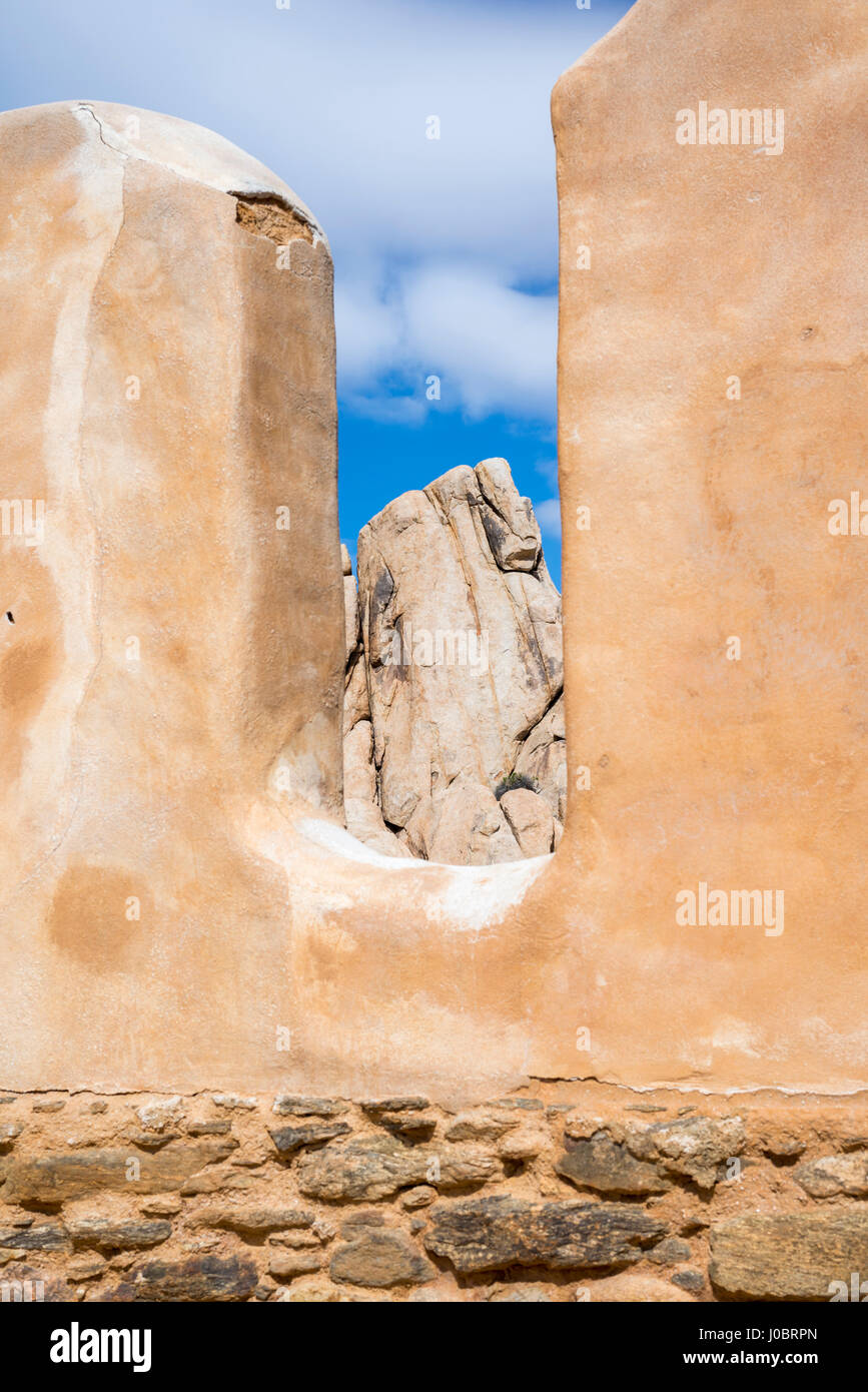 View of rock formations through the remnants of the Ryan Ranch. Joshua ...