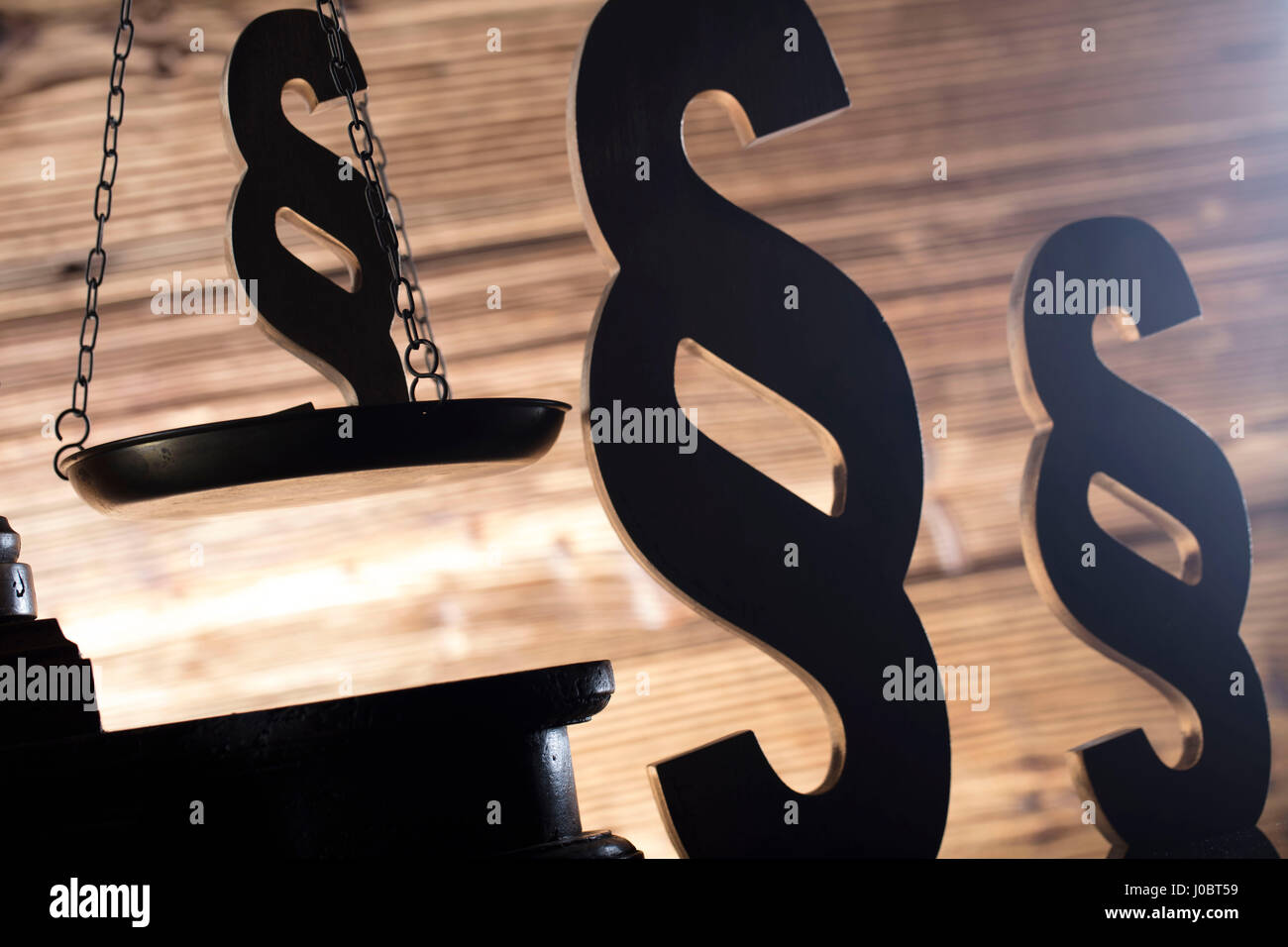 Law and justice concept. Scale of justice and legal code on wooden ...