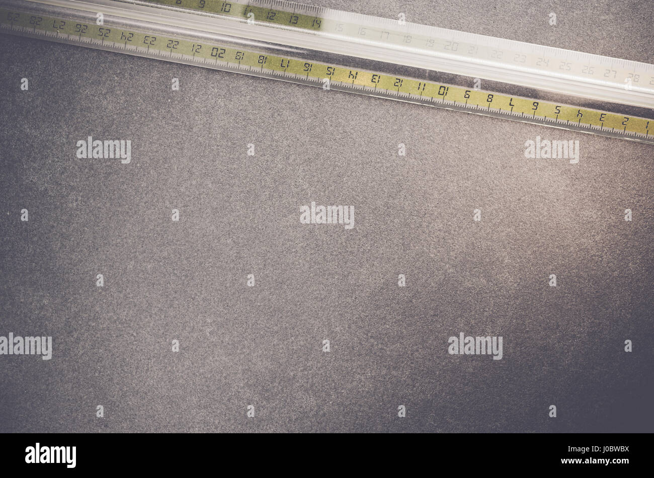 desk rulers on a stone surface worktop Stock Photo - Alamy