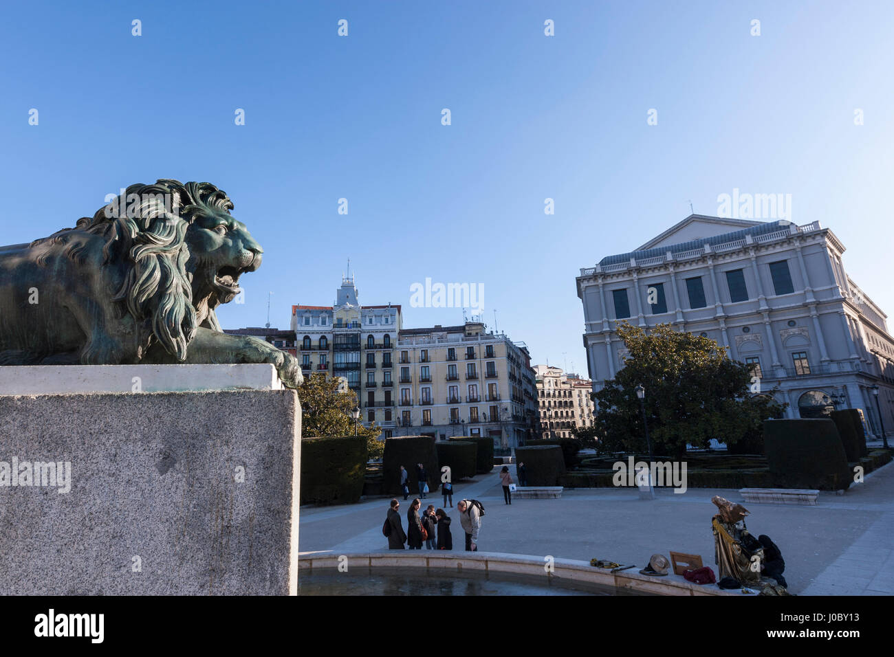 Lion sculptures in front of the Opera House near Palacio Real de Madrid ...