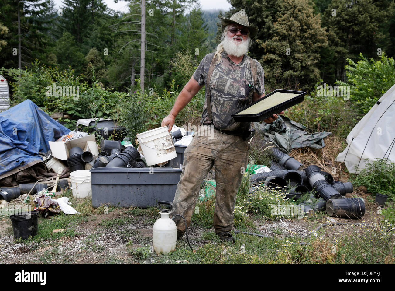 Timothy Littlefield, a member of the Yurok Indian Tribe, cultivates ...
