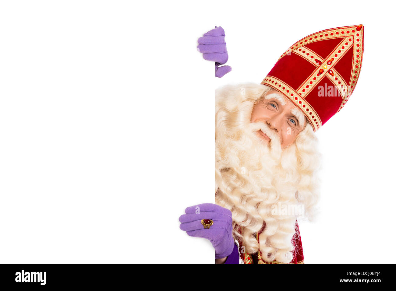 Smiling Sinterklaas with white board. isolated on white background ...