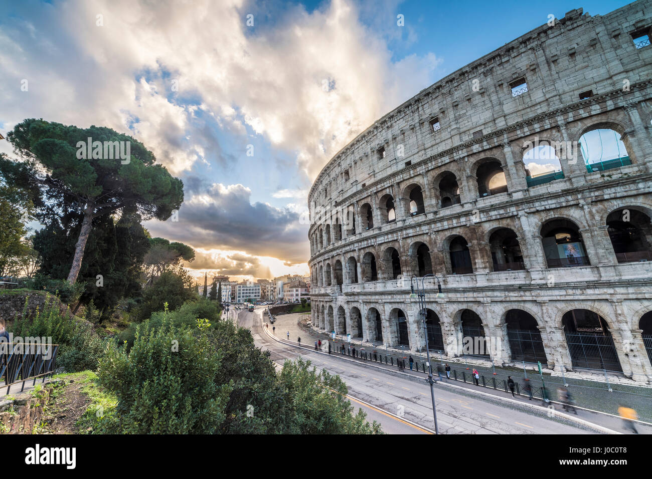 The pink sky at sunrise frames the ancient Colosseum (Flavian ...