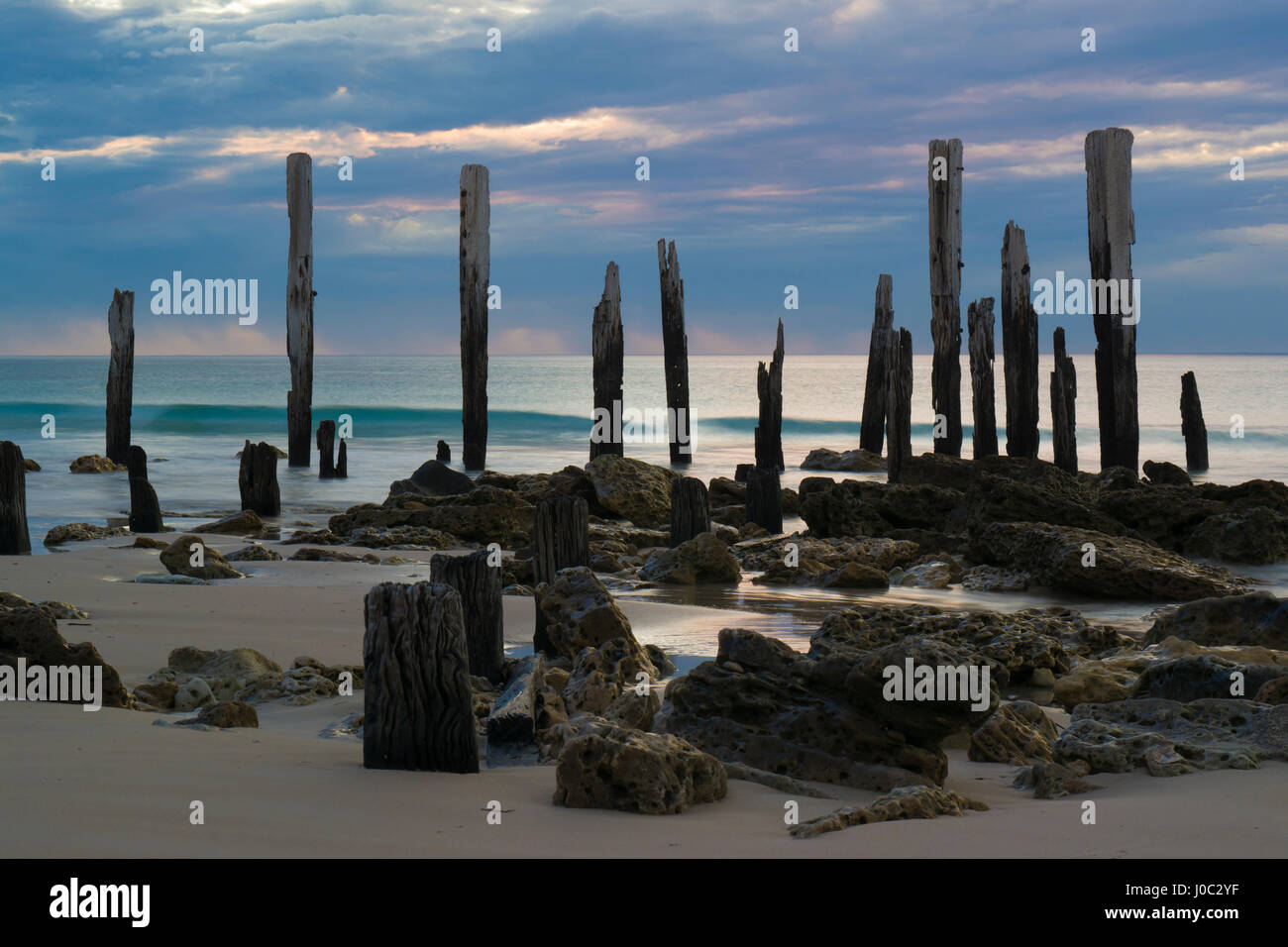 The jetty ruins at Port Willunga, South Australia at sunset. Slow ...