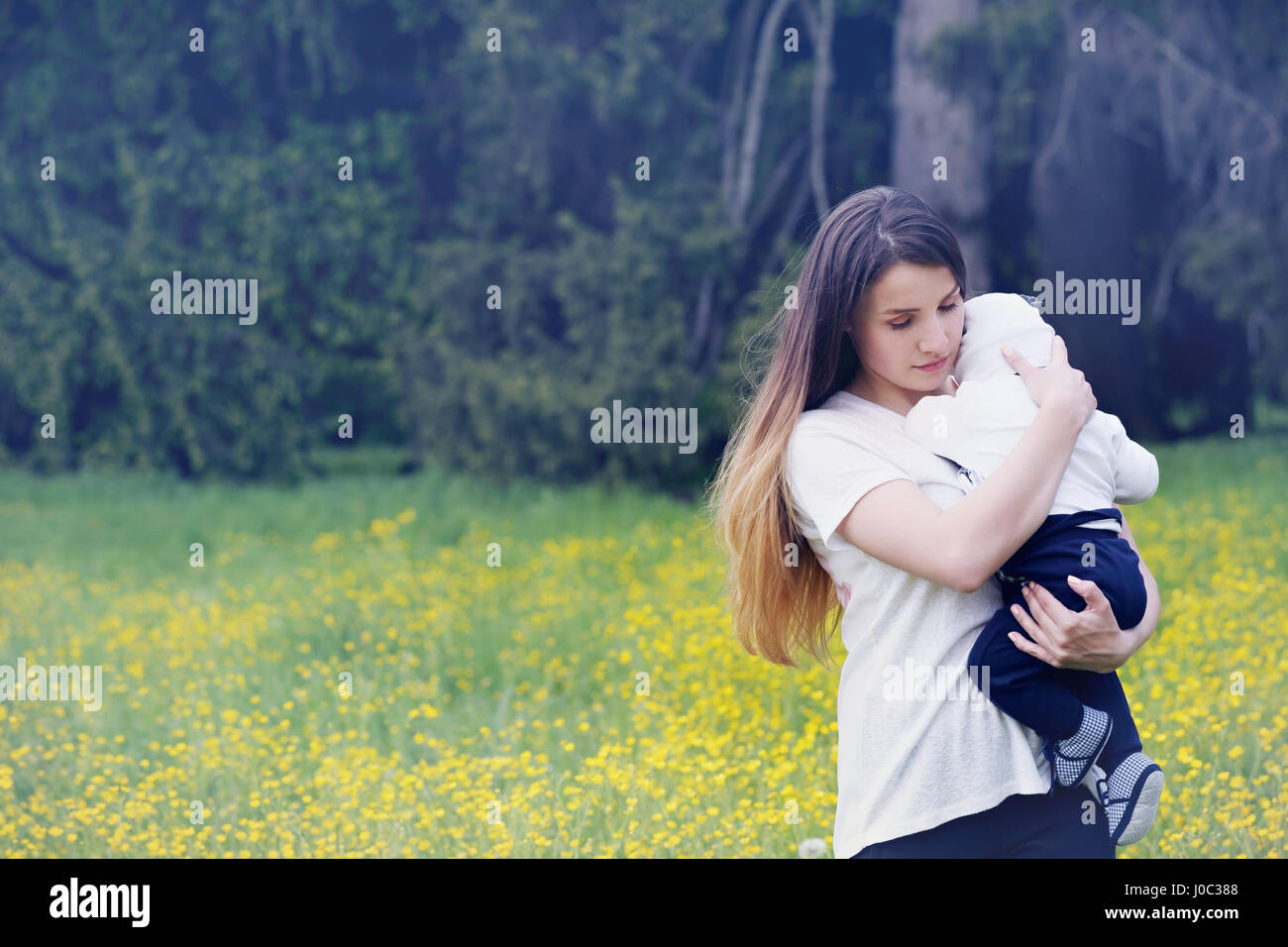 mother embracing her child Stock Photo - Alamy