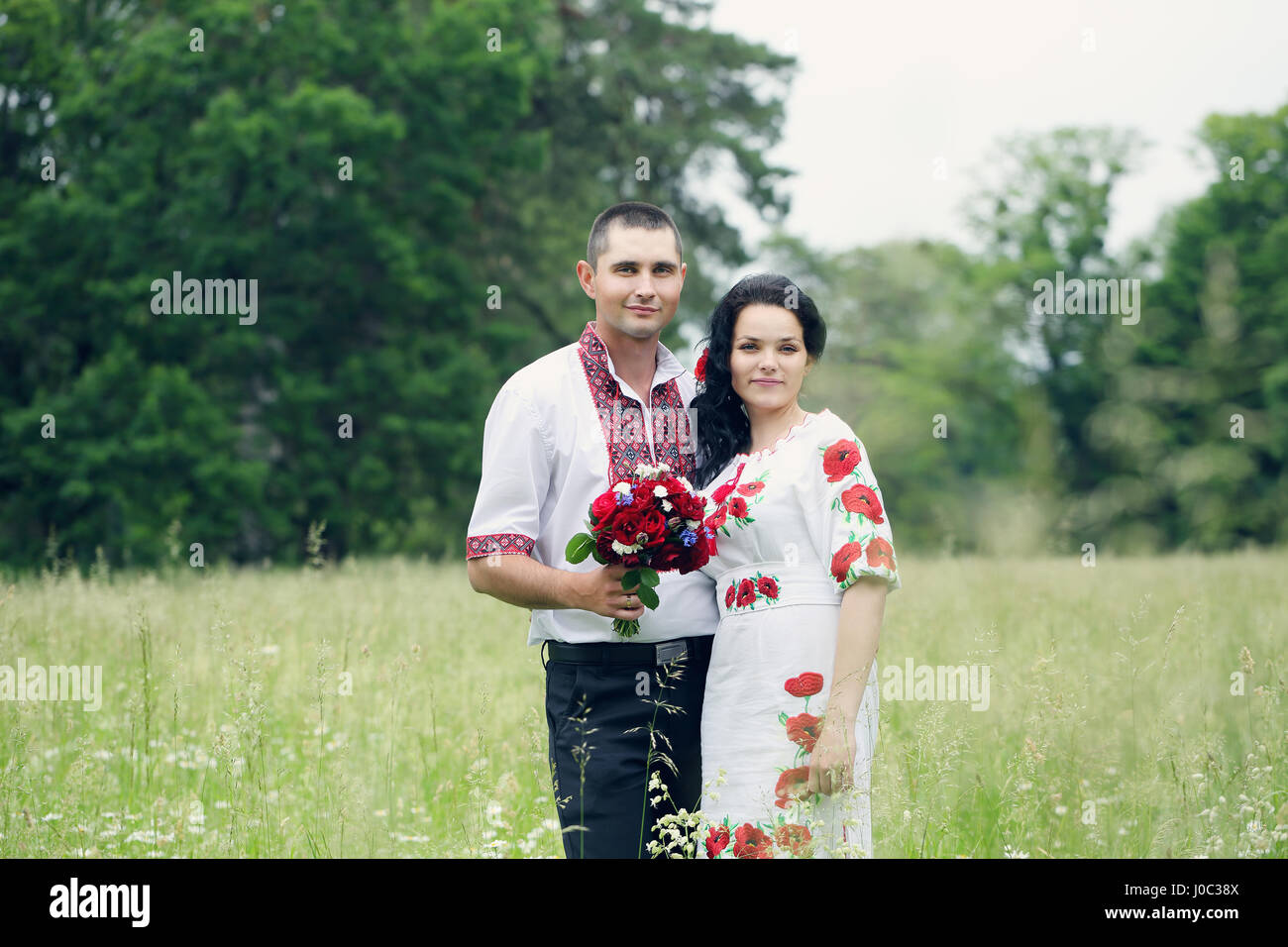 Couple in Ukrainian costumes Stock Photo - Alamy