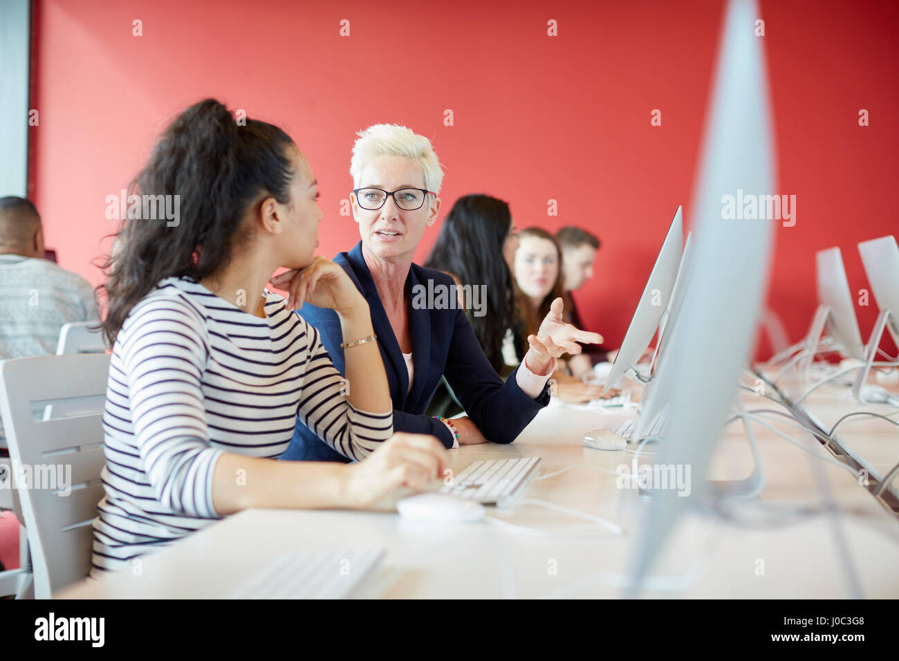 University students working at computer in class Stock Photo - Alamy