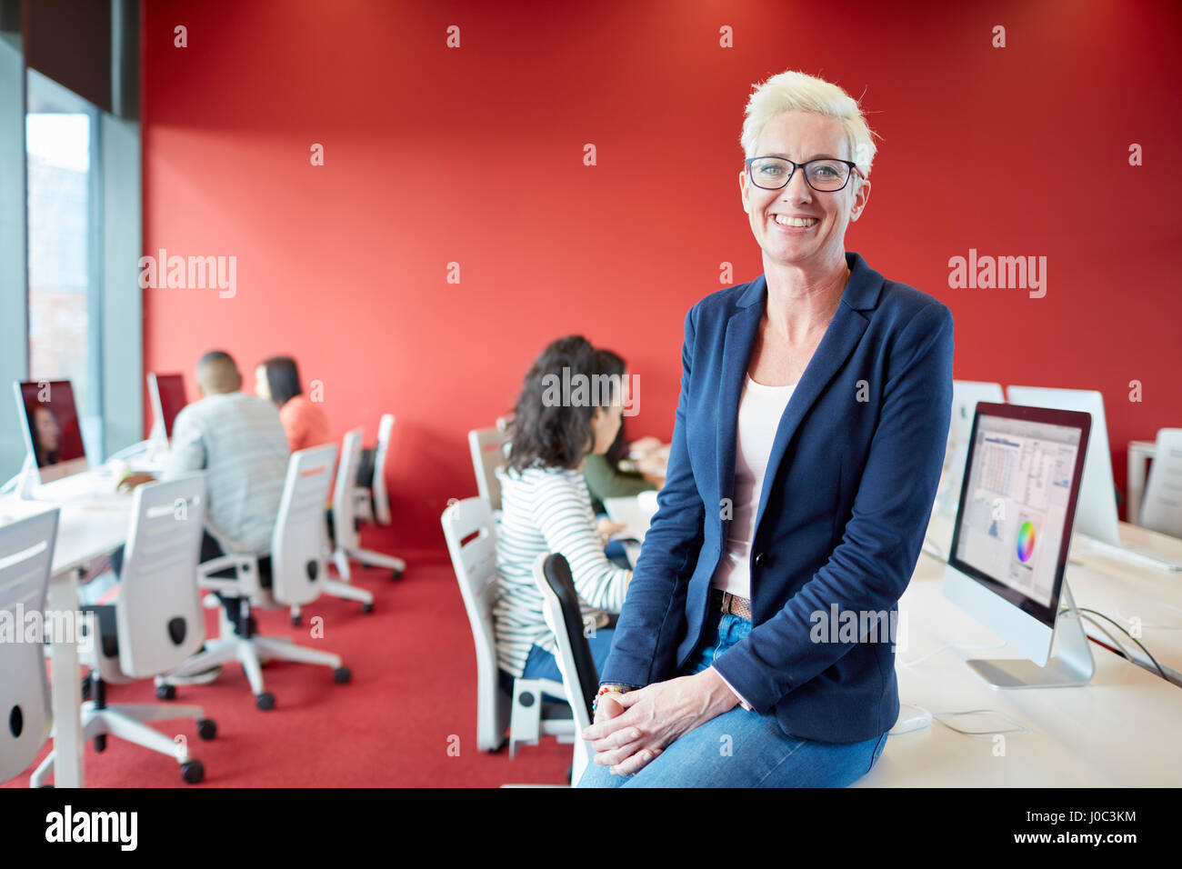 University students working at computer in class Stock Photo - Alamy