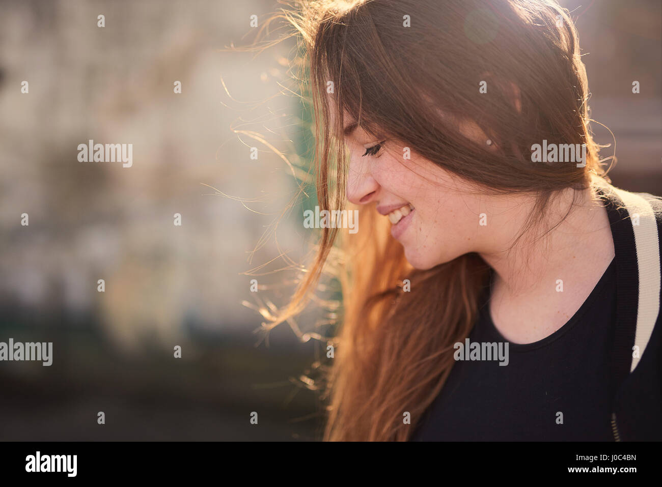 Portrait of young woman, outdoors, smiling, Bristol, UK Stock Photo - Alamy
