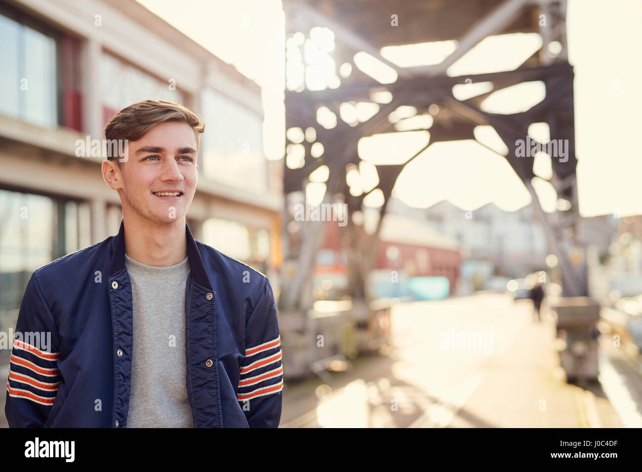 Man walking outdoors, Bristol, UK Stock Photo - Alamy