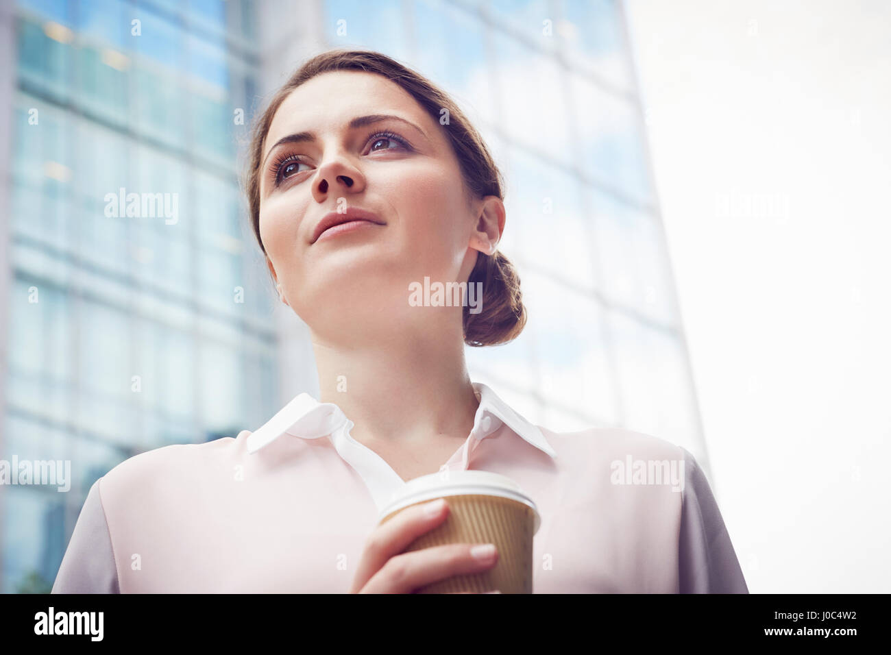 Business woman on coffee break, London, UK Stock Photo - Alamy
