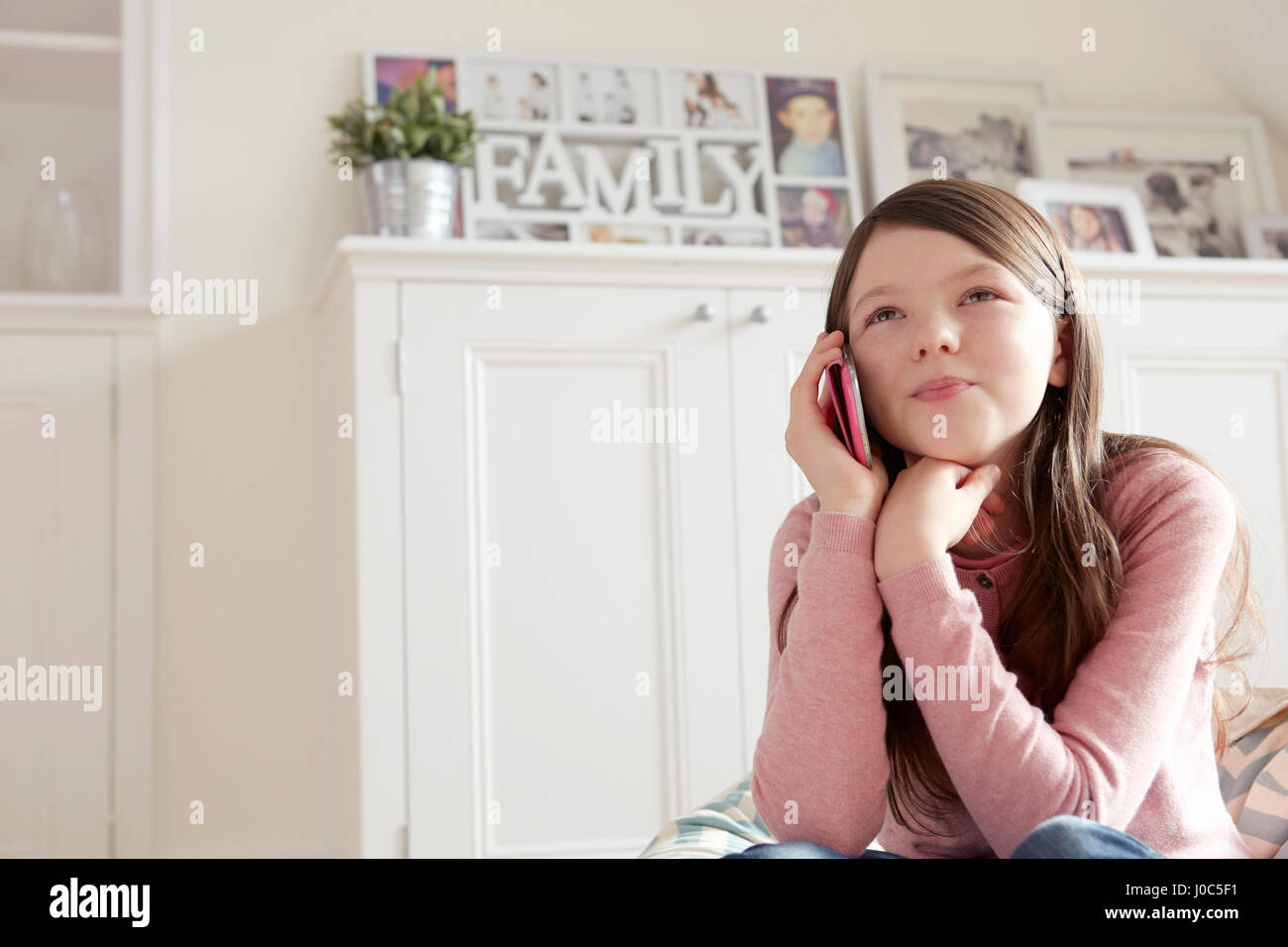 Girl making smartphone call Stock Photo - Alamy