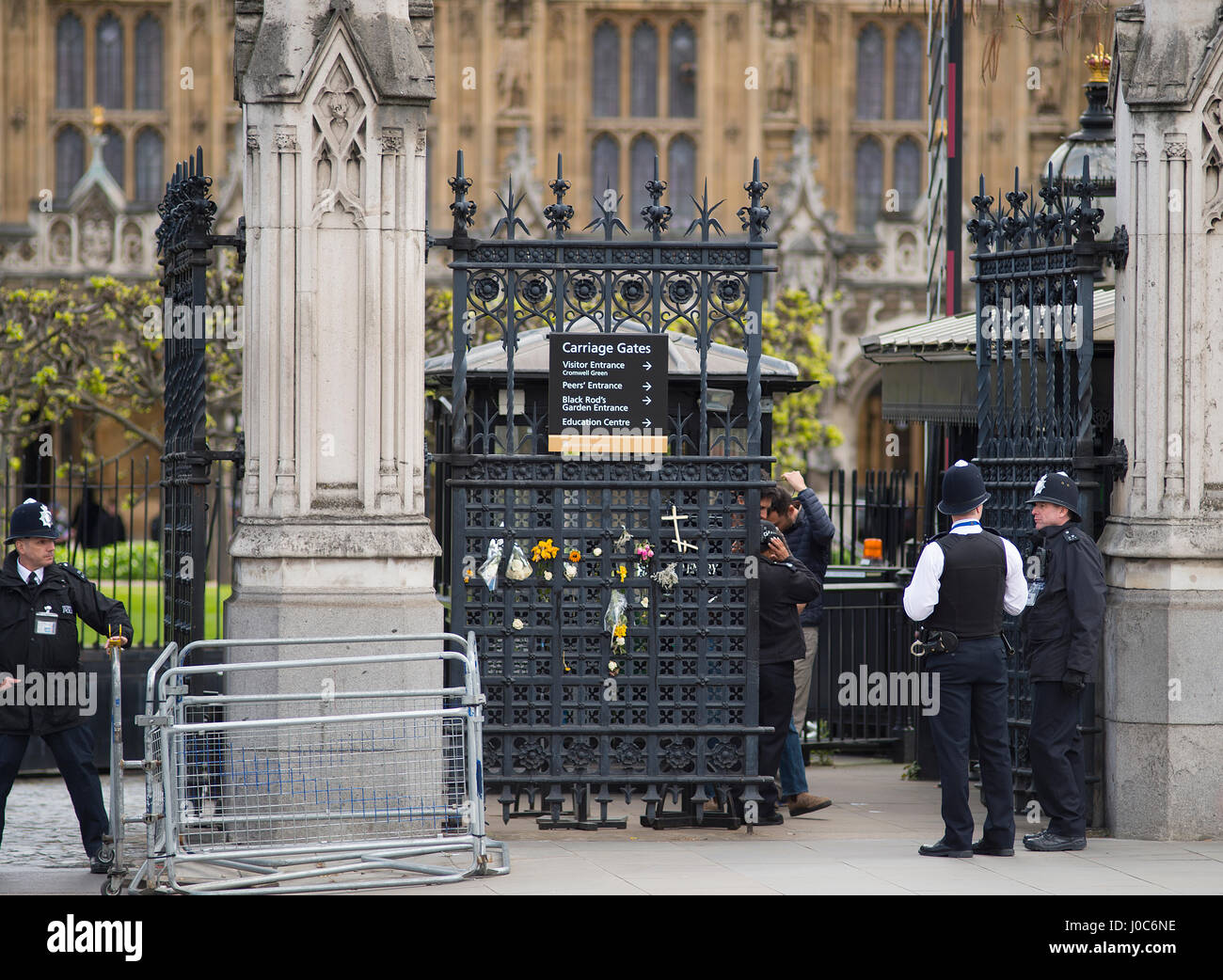 Metropolitan police officers at Carriage Gates entrance to the Palace ...