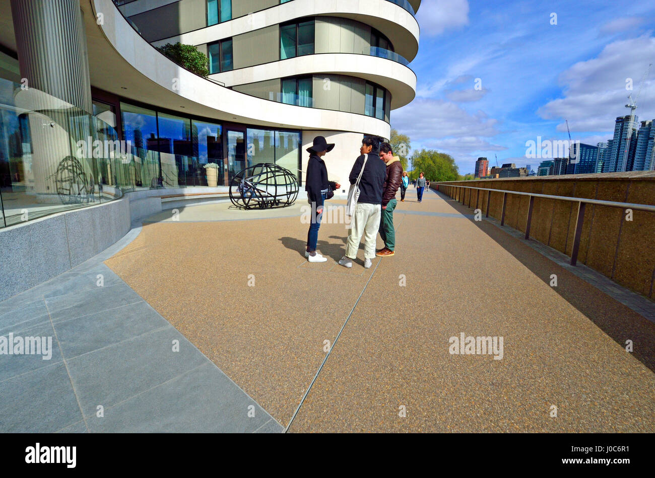 London, England, UK. Japanese tourists in front of Riverwalk apartment ...