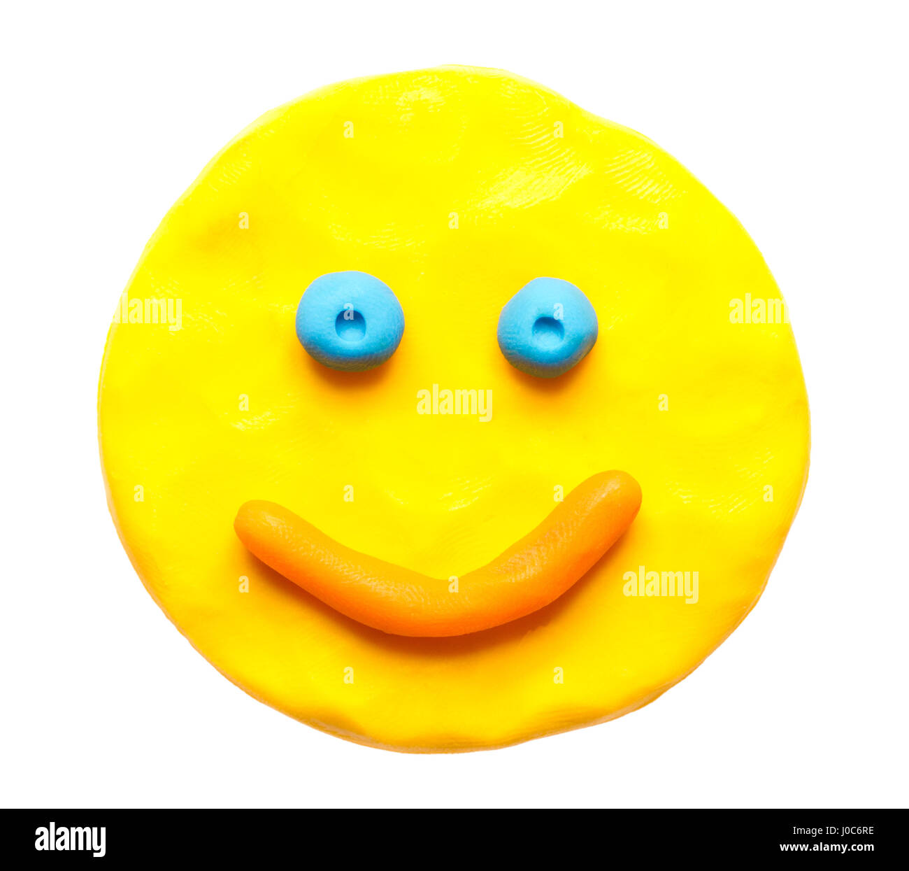 Plasticine smiling faces isolated on white background Stock Photo - Alamy