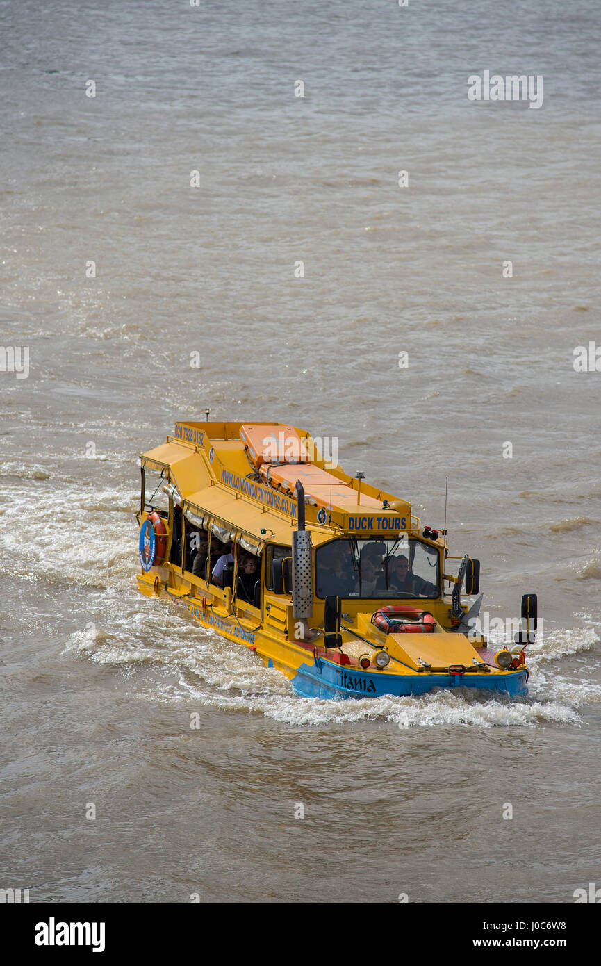 Amphibious duck vehicles on the river Thames, central London. Credit ...