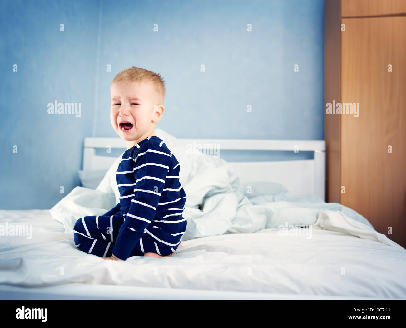 Sad boy bedroom hi-res stock photography and images - Alamy