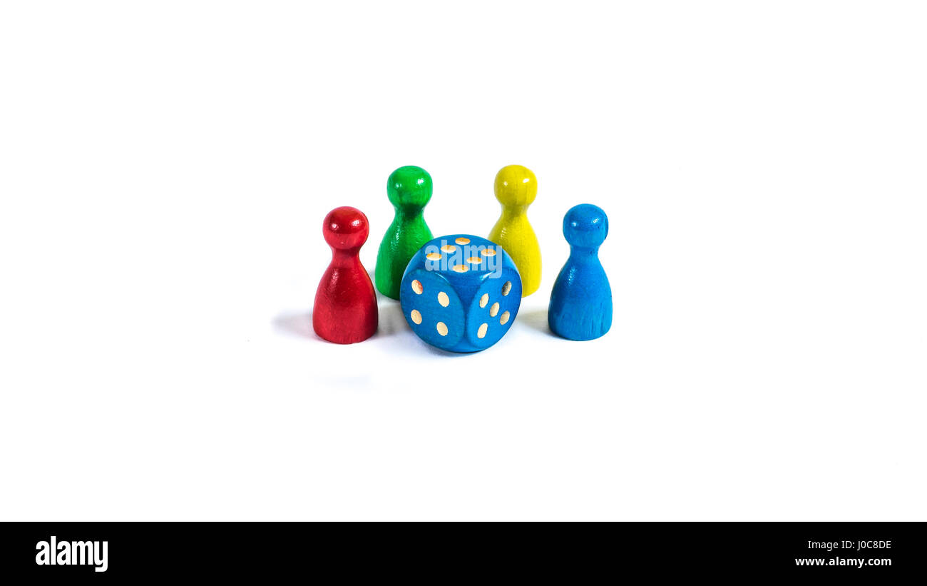 Board game figures and a dice in front of white background Stock Photo ...