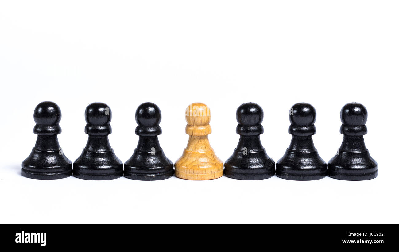Chess pieces in front of white background - Odd one out Stock Photo - Alamy