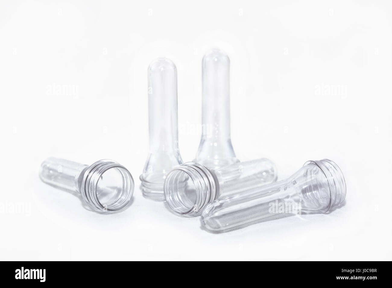 Clear PET Preforms on white background for presentation Stock Photo - Alamy