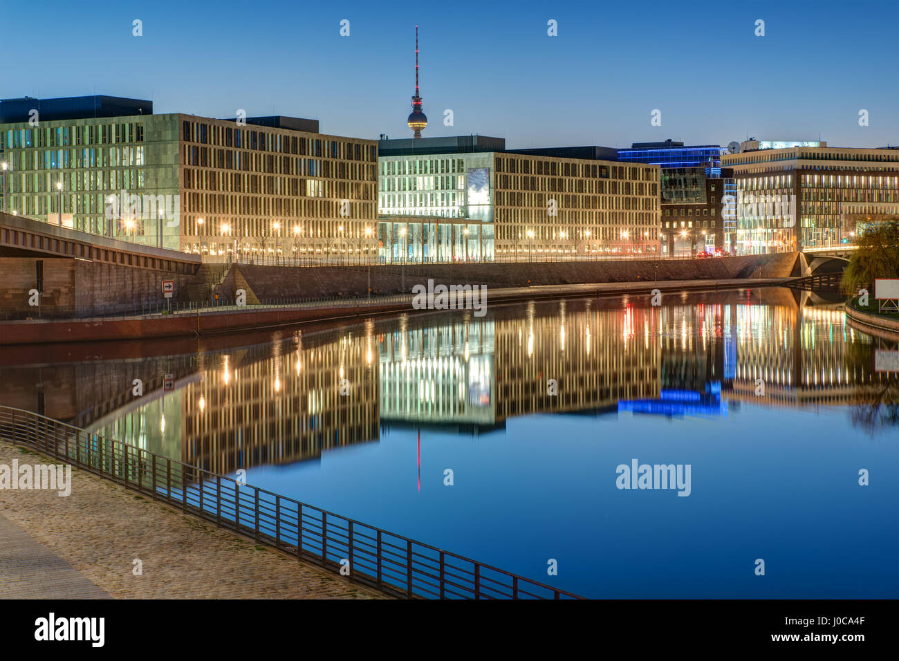Office buildings at the river Spree in Berlin with the Television tower ...