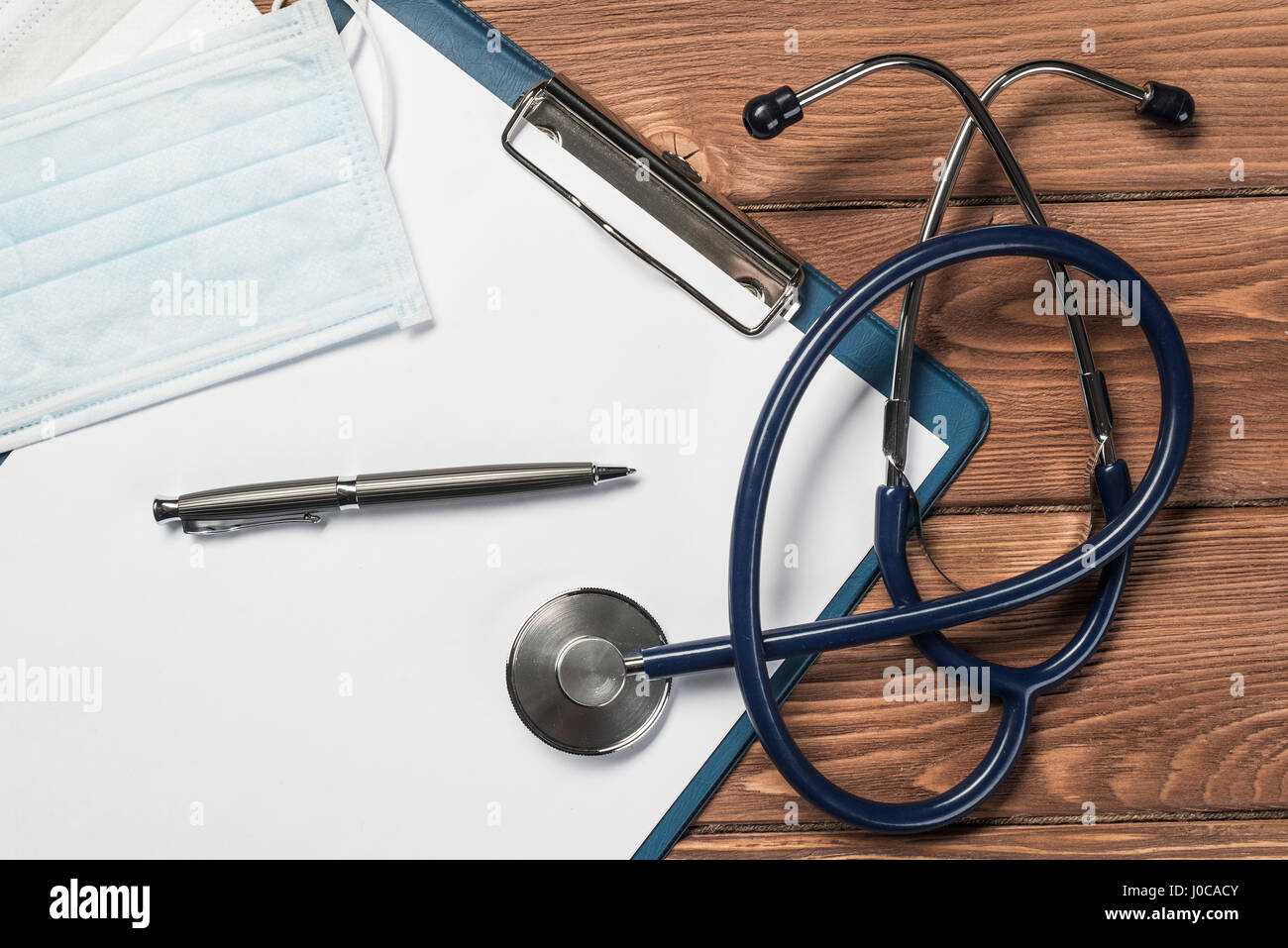 Desk of doctor with medicine things Stock Photo - Alamy