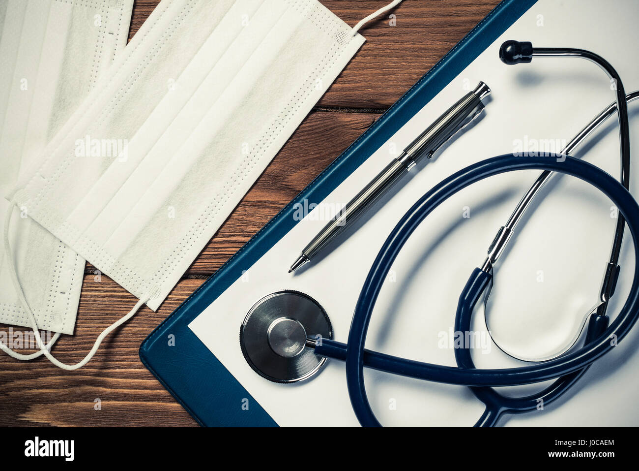 Desk of doctor with medicine things Stock Photo - Alamy