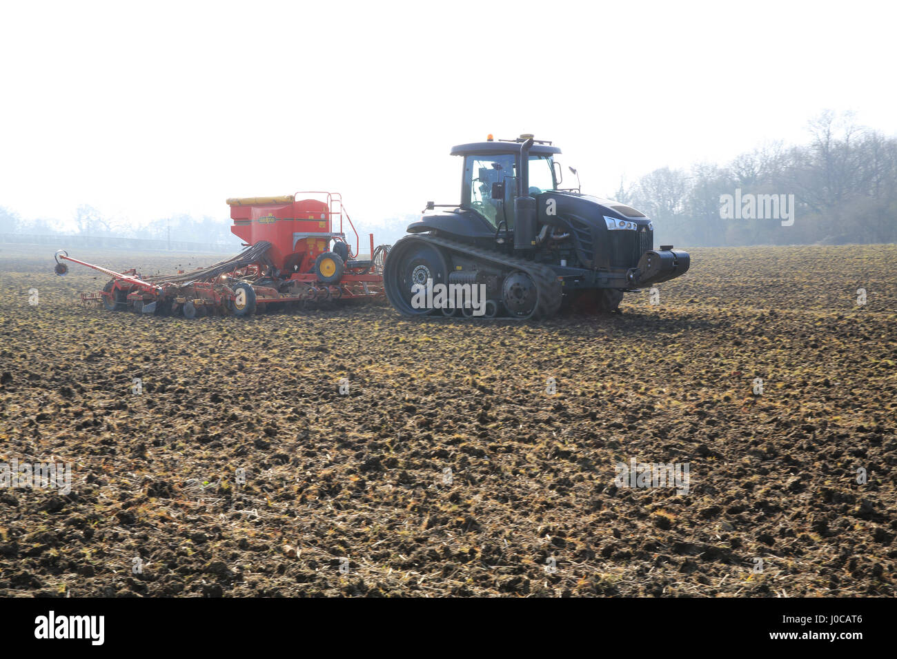 Ploughing a field in spring, preparing to plant crops, in Kent, SE ...